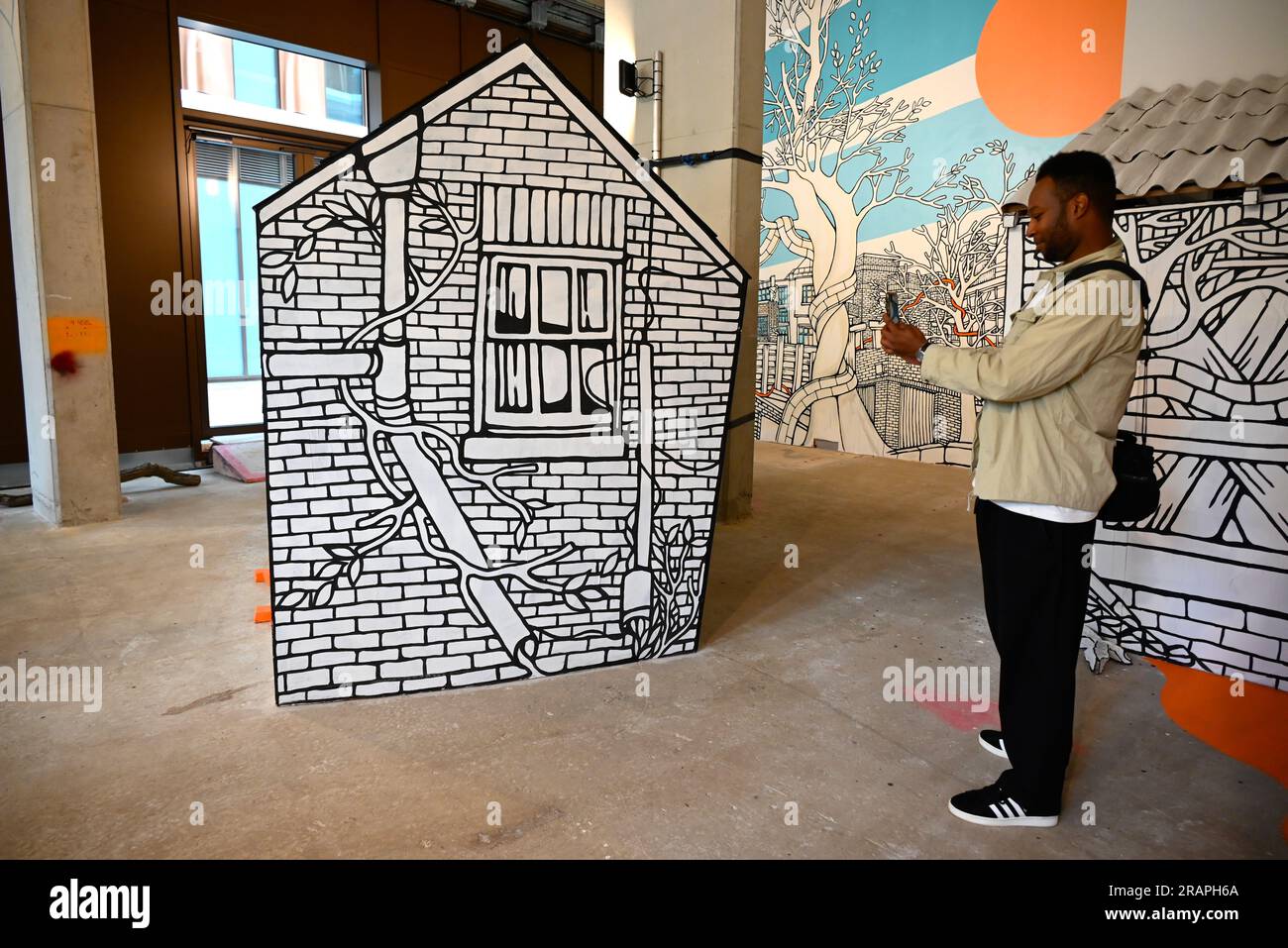 Key features of the installation include Peel’s trademark murals ...