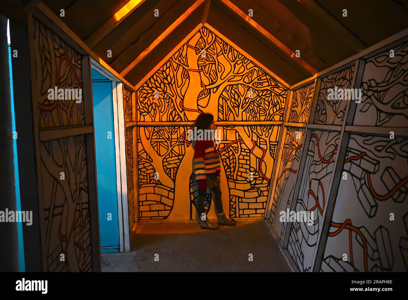 Key features of the installation include Peel’s trademark murals ...