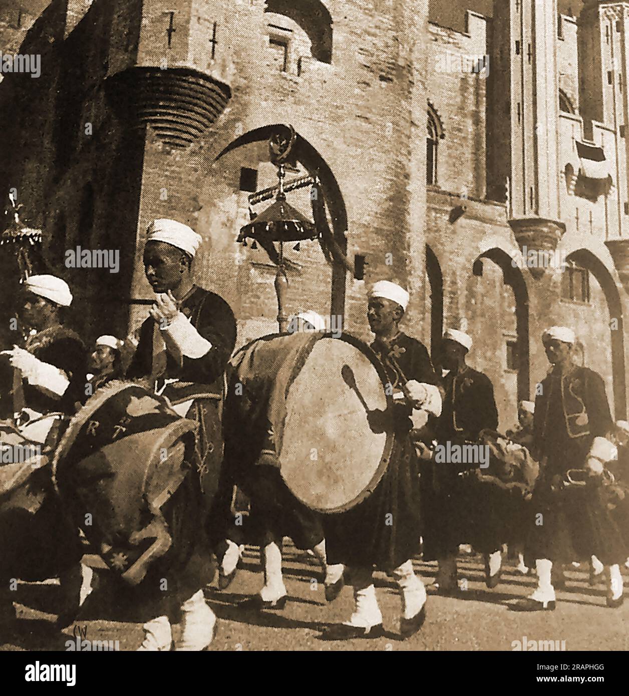 Spahis marching past the Palace of the Popes, Avignon, France in 1939 ...