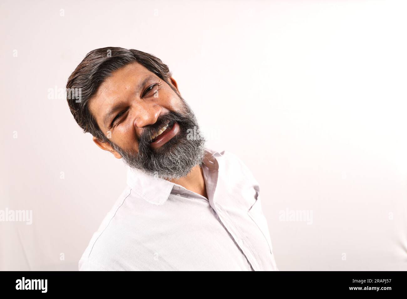Portrait of Indian bearded man wearing shirt. Funky expressions ...
