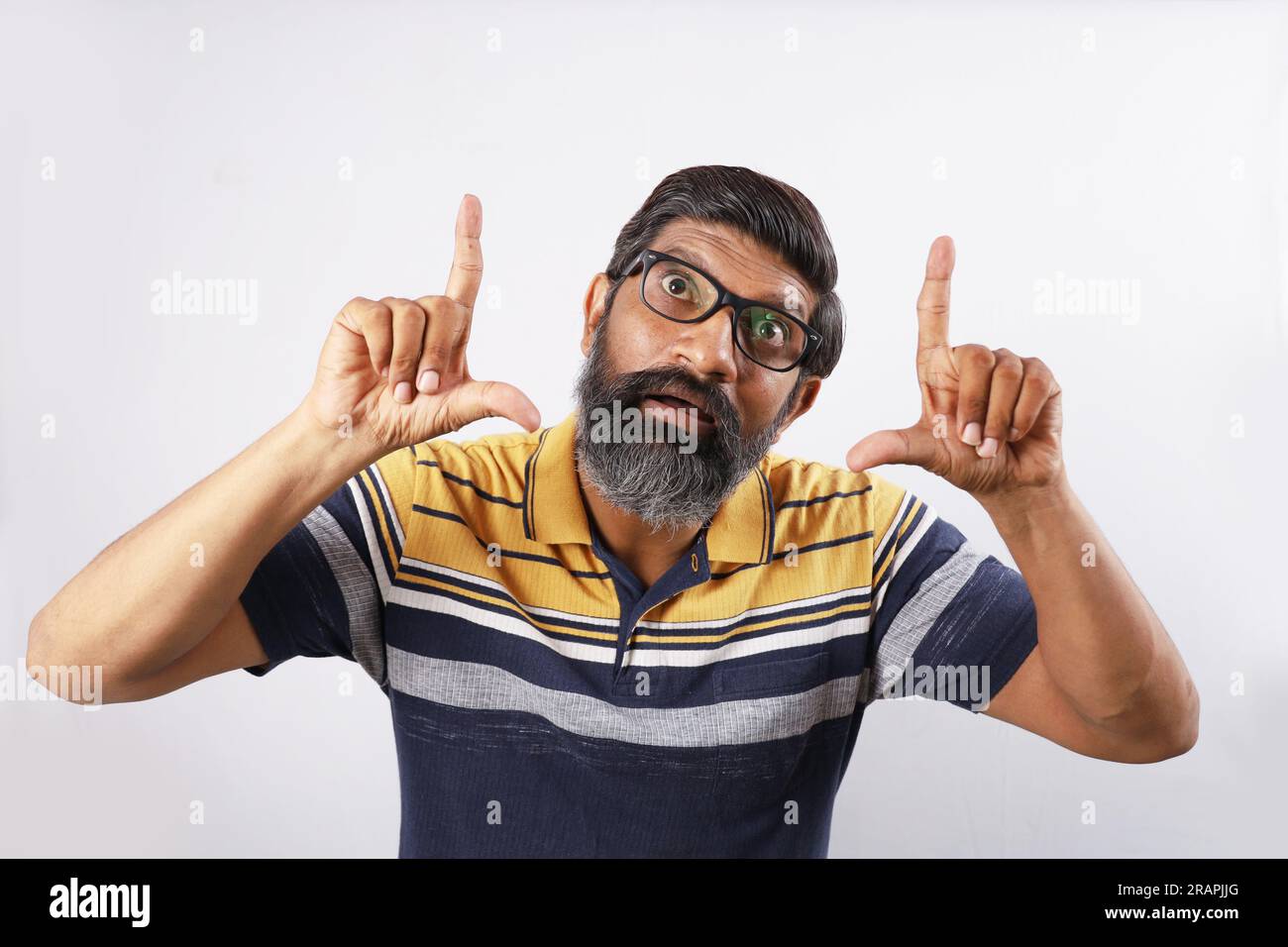 Portrait of an Indian bearded man wearing specs and t-shirt. Funky ...