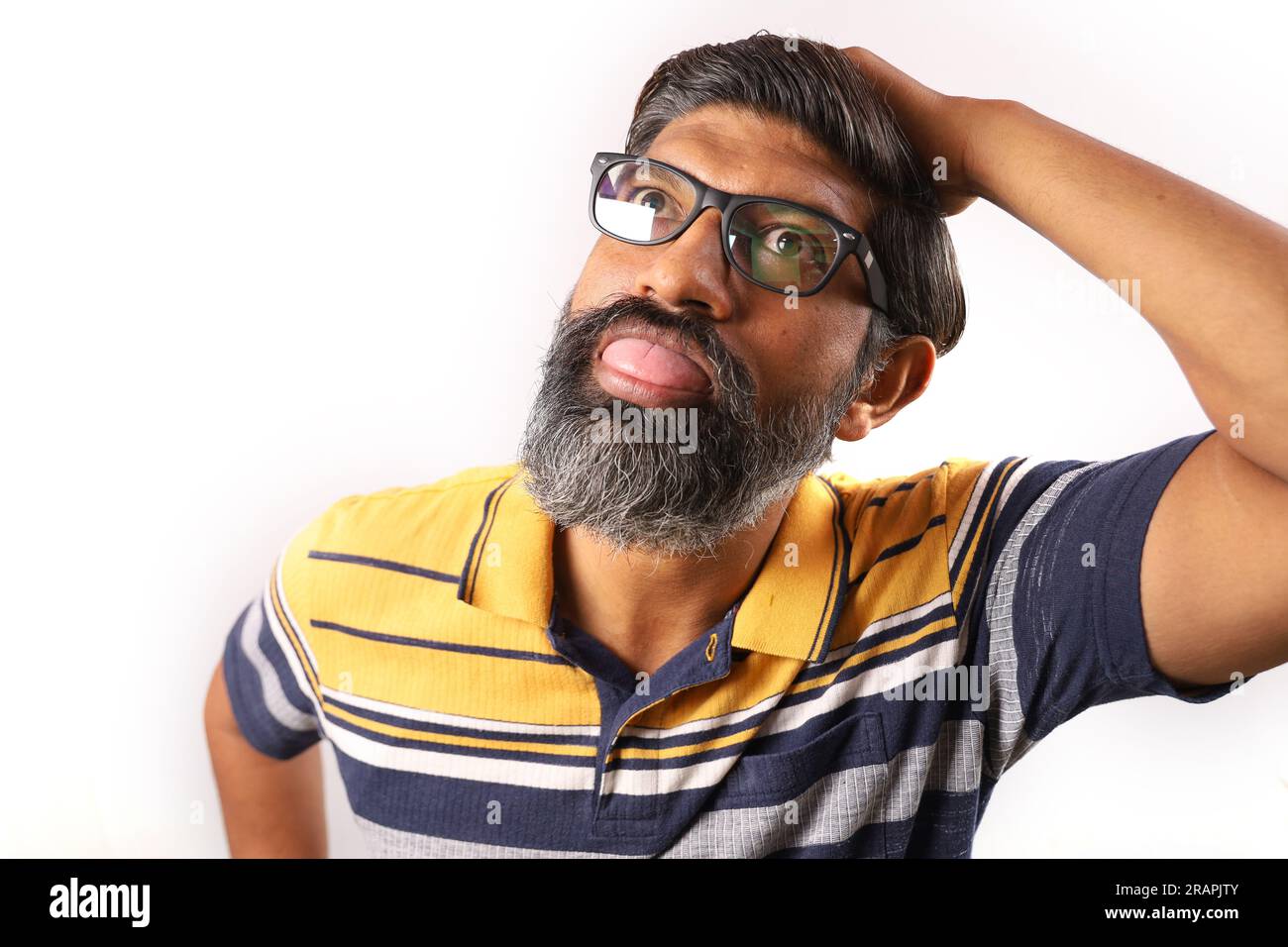 Portrait of an Indian bearded man wearing specs and t-shirt. Funky ...