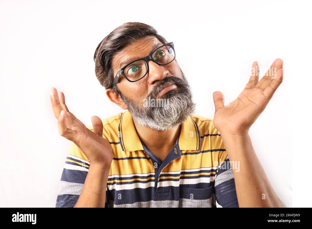 Portrait of an Indian bearded man wearing specs and t-shirt. Funky ...