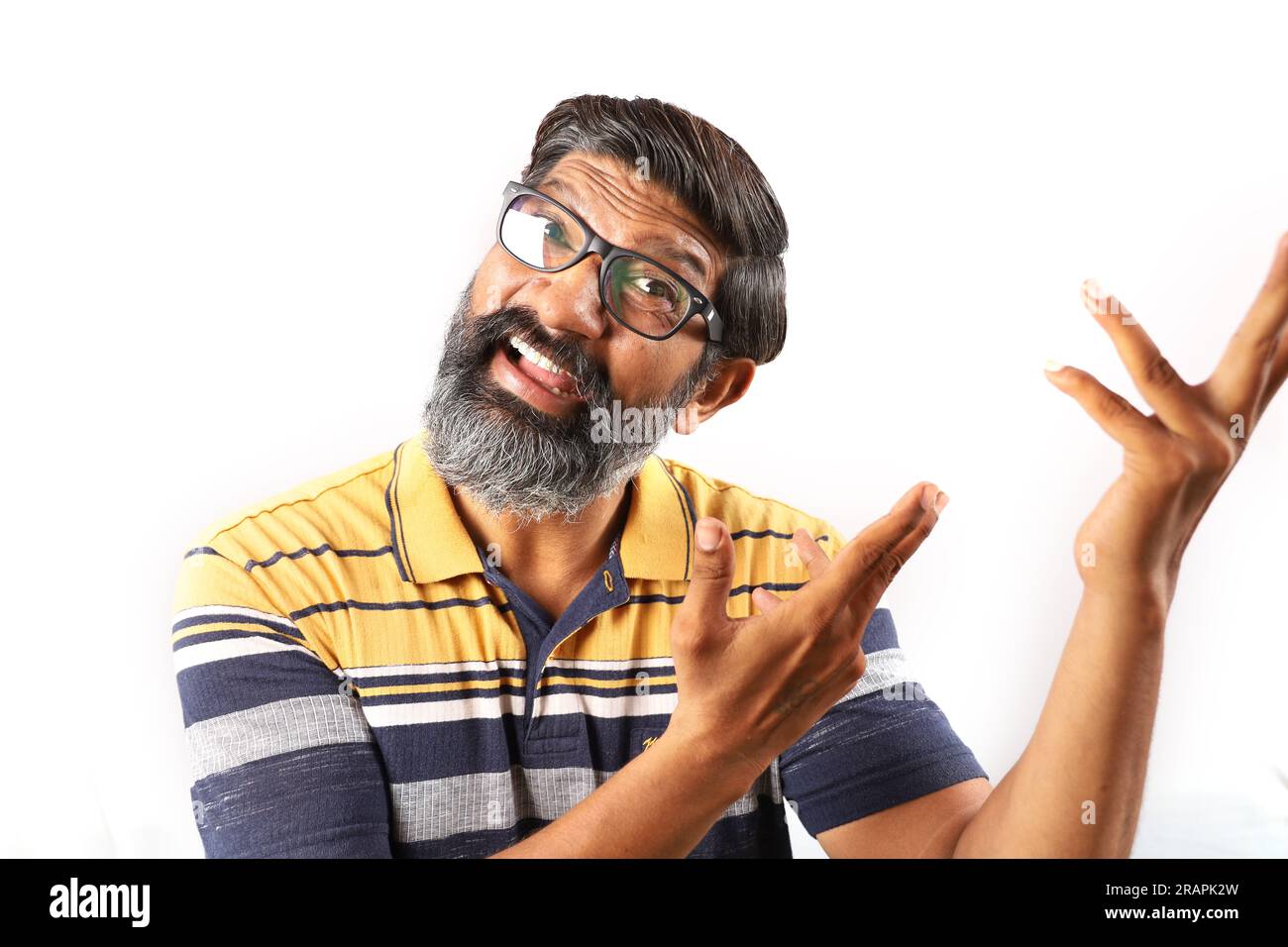 Portrait of an Indian bearded man wearing specs and t-shirt. Funky ...