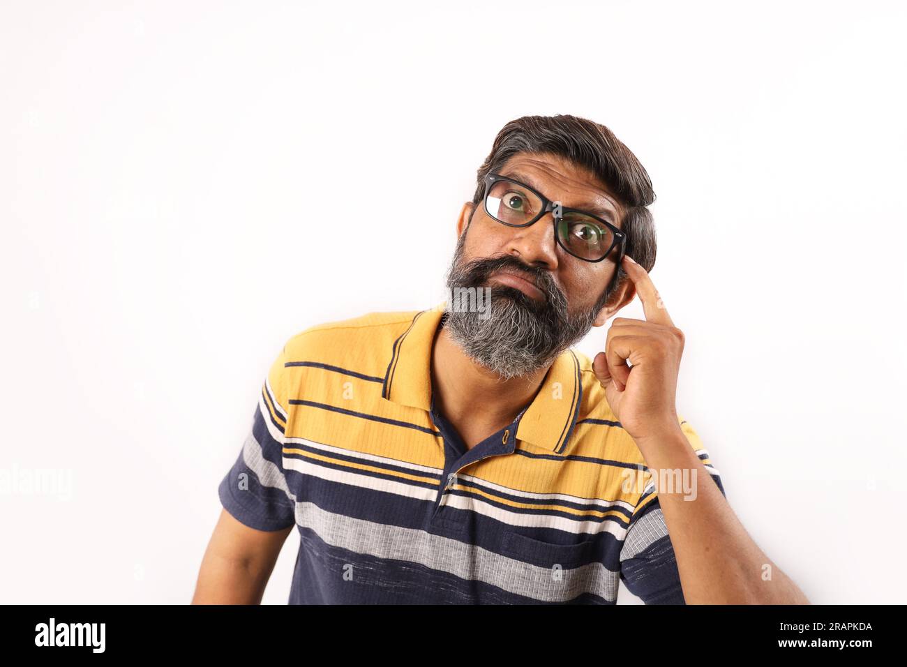Portrait of an Indian bearded man wearing specs and t-shirt. Funky ...