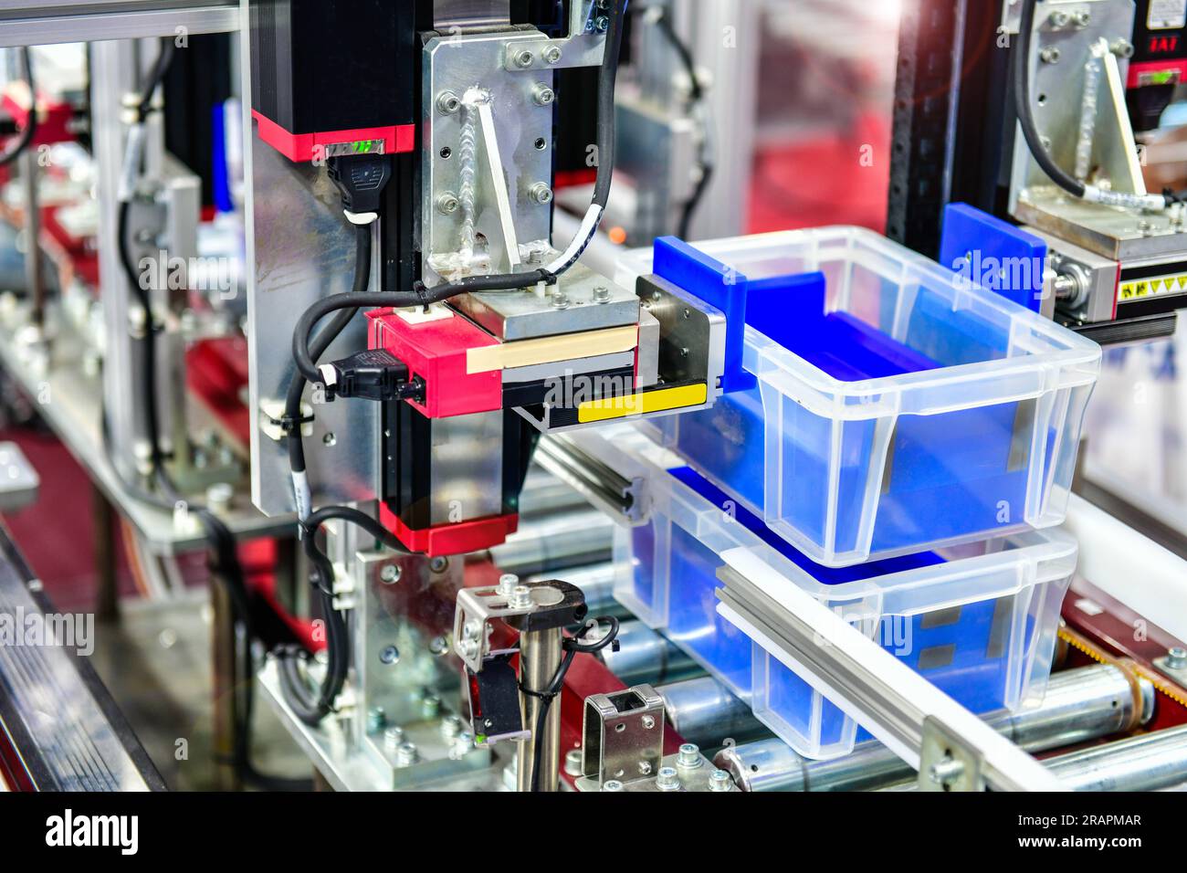 Automated storage warehouse with white plastic in production line ...