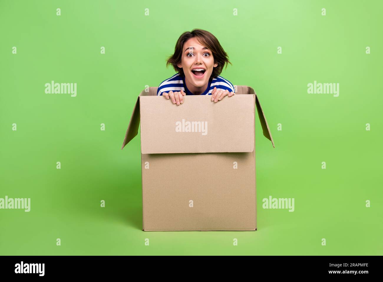 Full size photo of young funky girl inside unboxing package carton box ...
