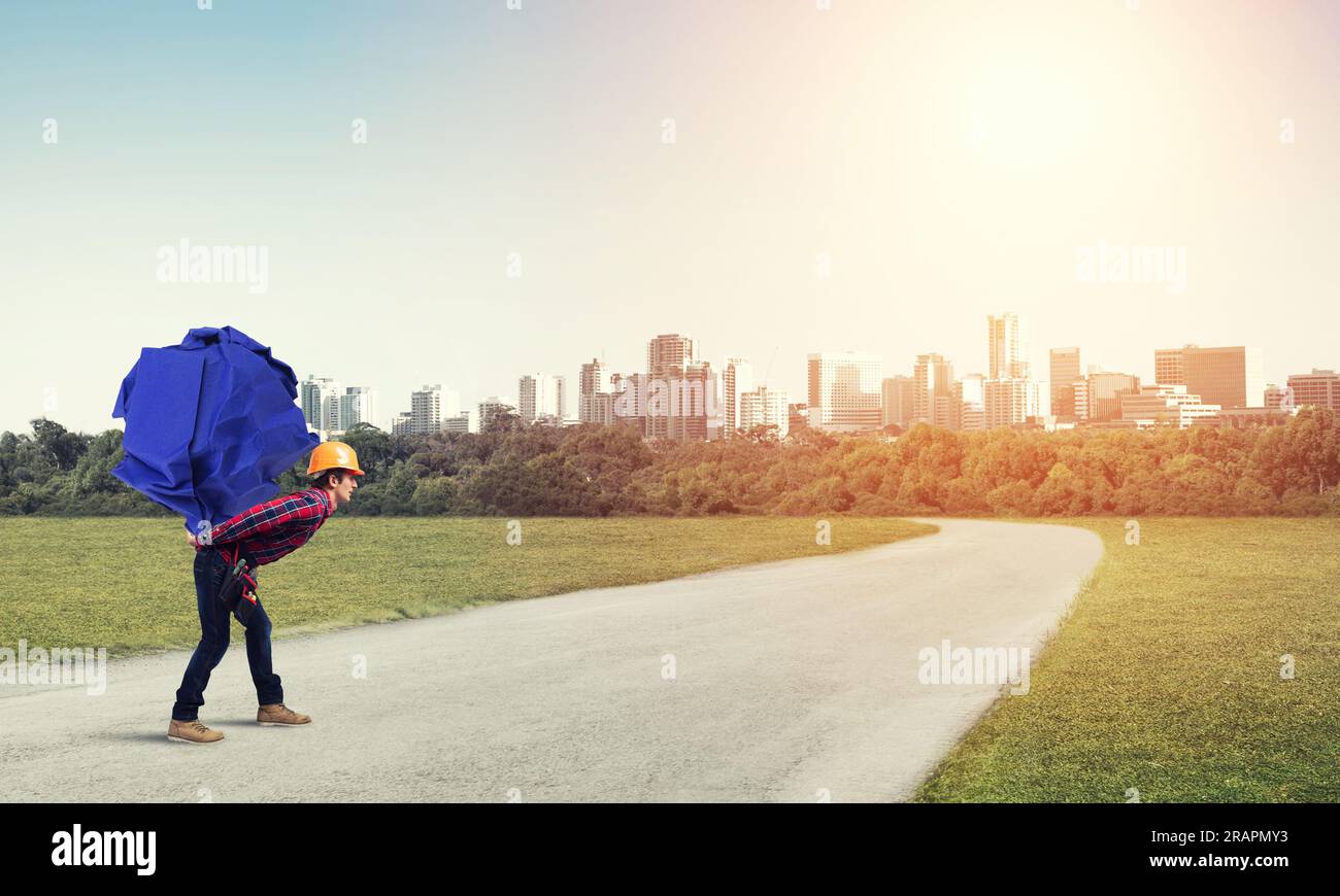 Engineer man carry load Stock Photo - Alamy