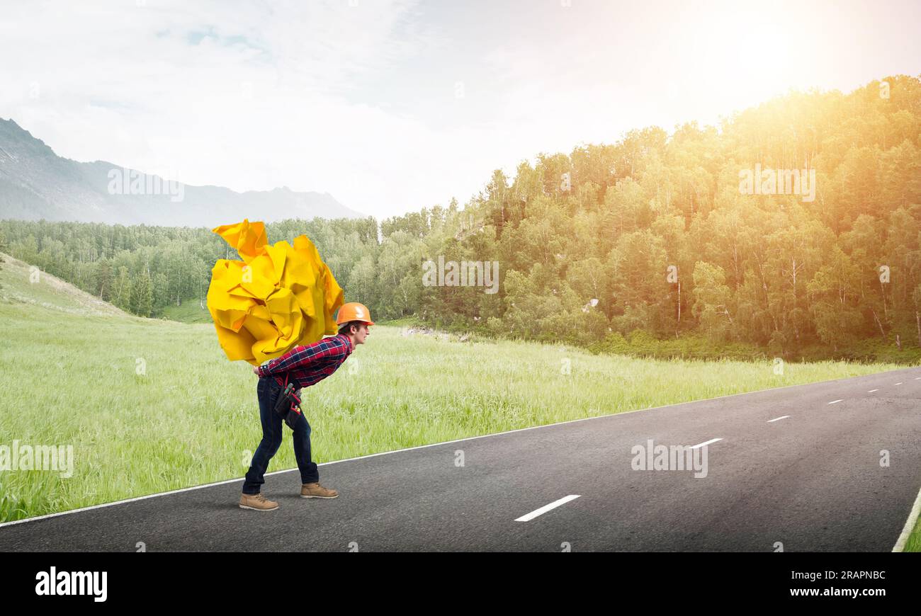Engineer man carry load Stock Photo - Alamy