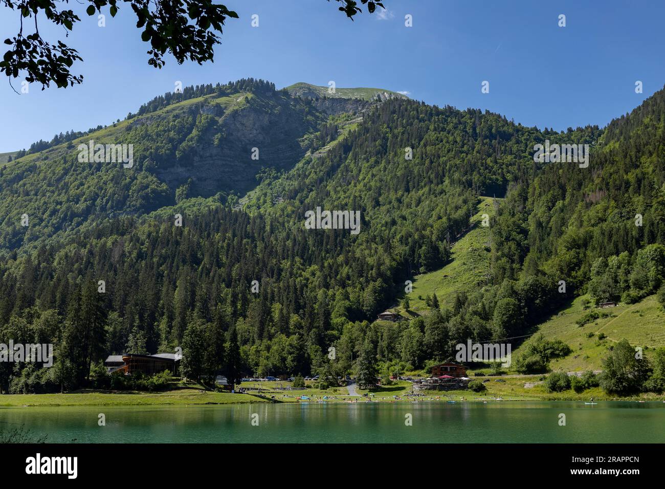 Lac Montriond seen from above. Aerial of French Alps mountain range ...