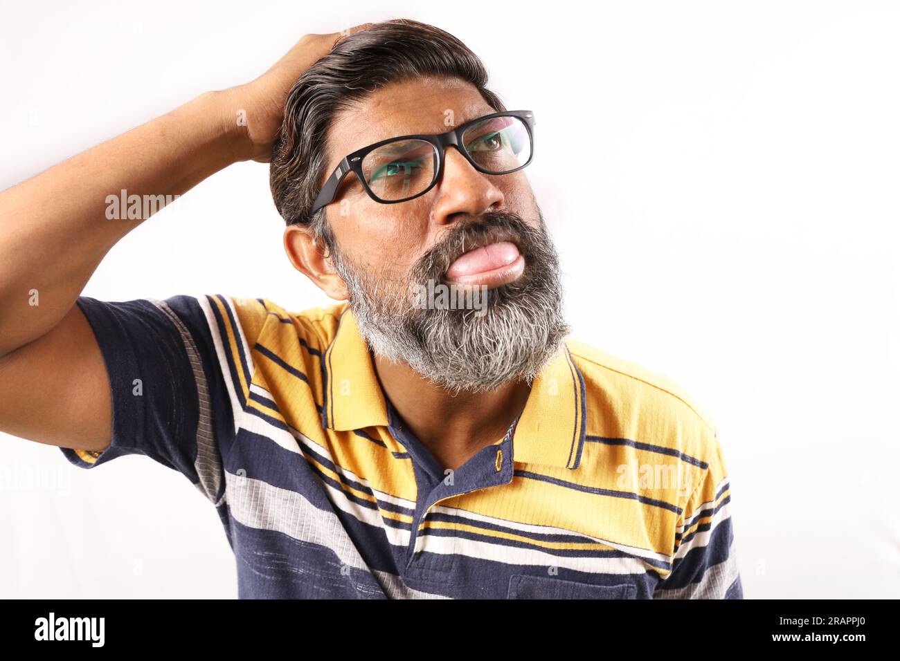 Portrait of an Indian bearded man wearing specs and t-shirt. Funky ...