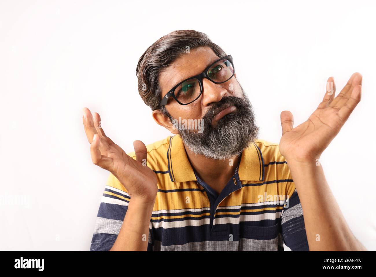 Portrait of an Indian bearded man wearing specs and t-shirt. Funky ...