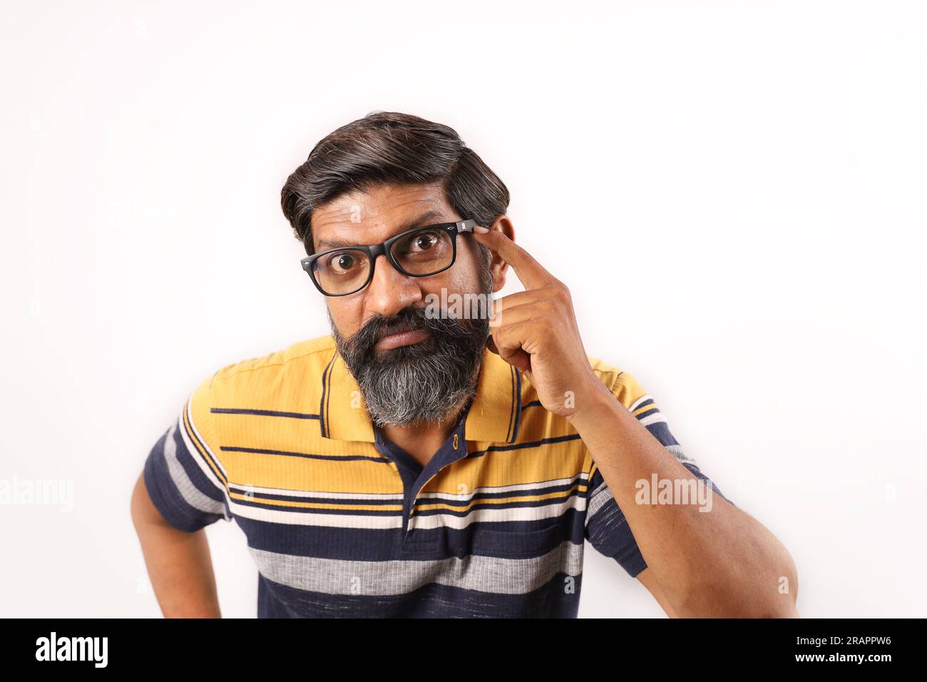 Portrait of an Indian bearded man wearing specs and t-shirt. Funky ...