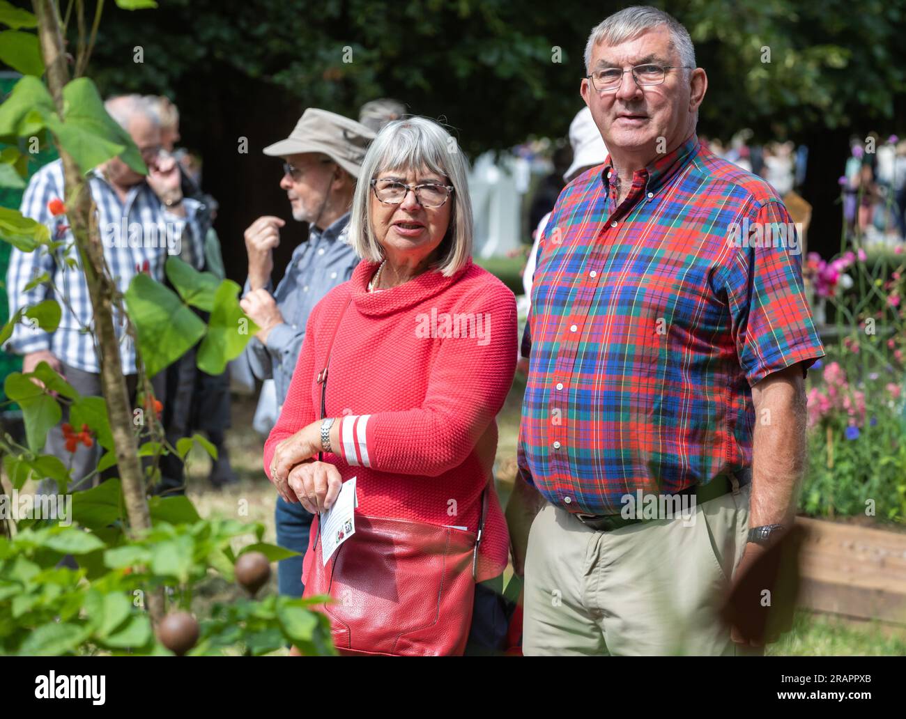 People attend the first day of Hampton Court Palace Flower Festival ...