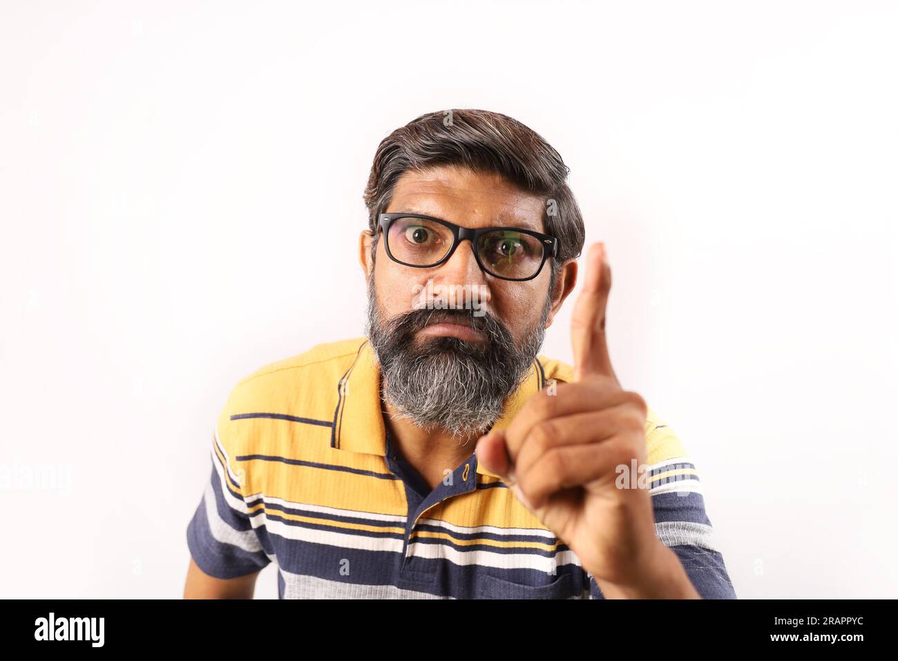 Portrait of an Indian bearded man wearing specs and t-shirt. Funky ...