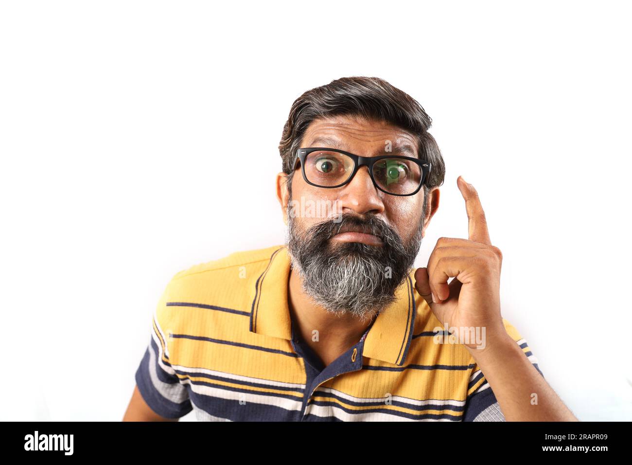 Portrait of an Indian bearded man wearing specs and t-shirt. Funky ...