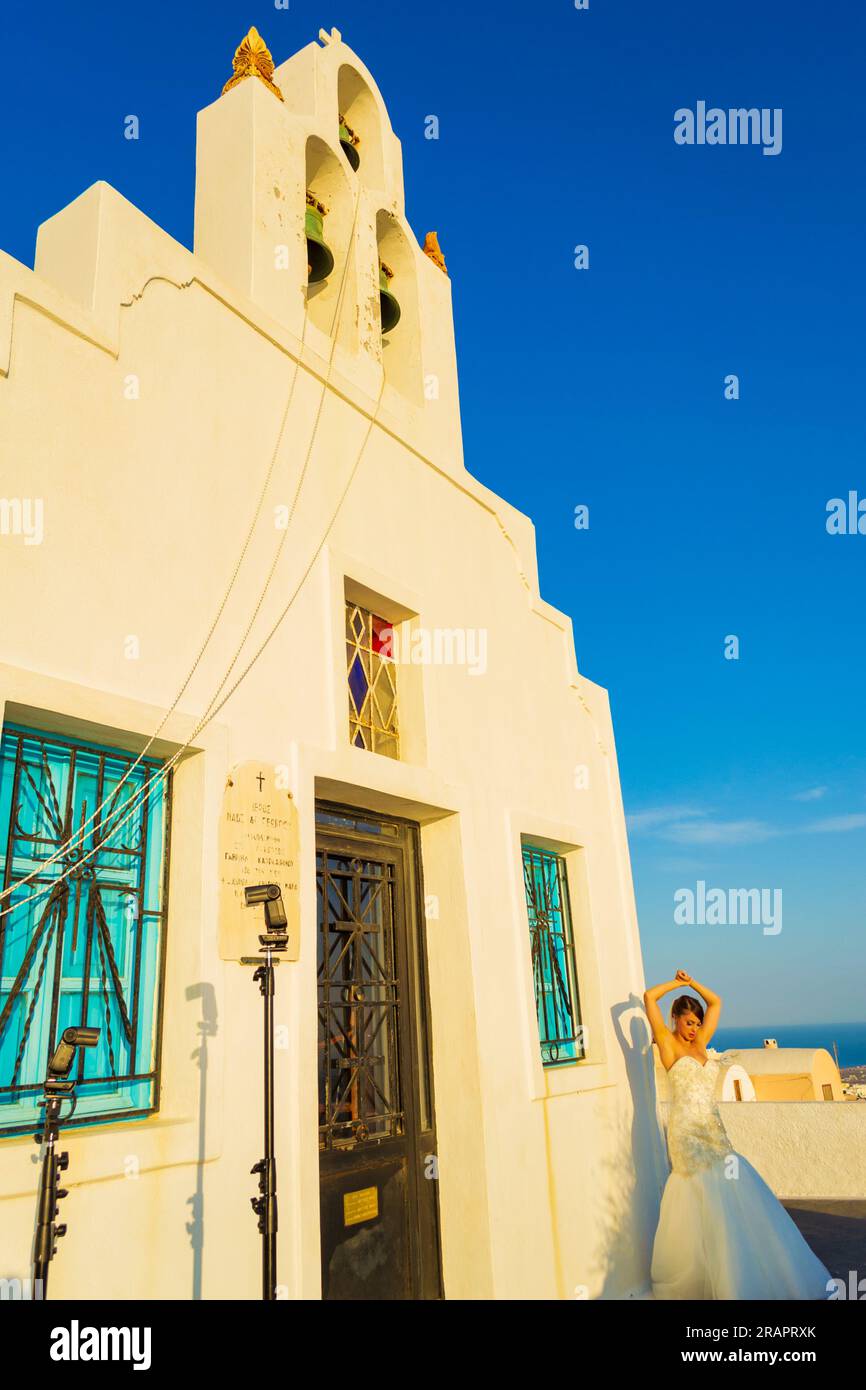 Beautiful unidentified young female model posing in white bridal dress ...