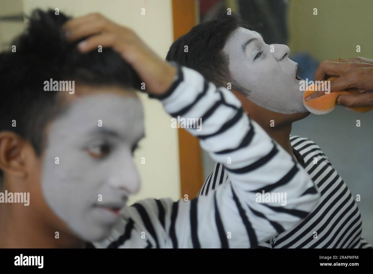 Mime artists from a mime group,"Sur-Pancham", are getting ready for a ...