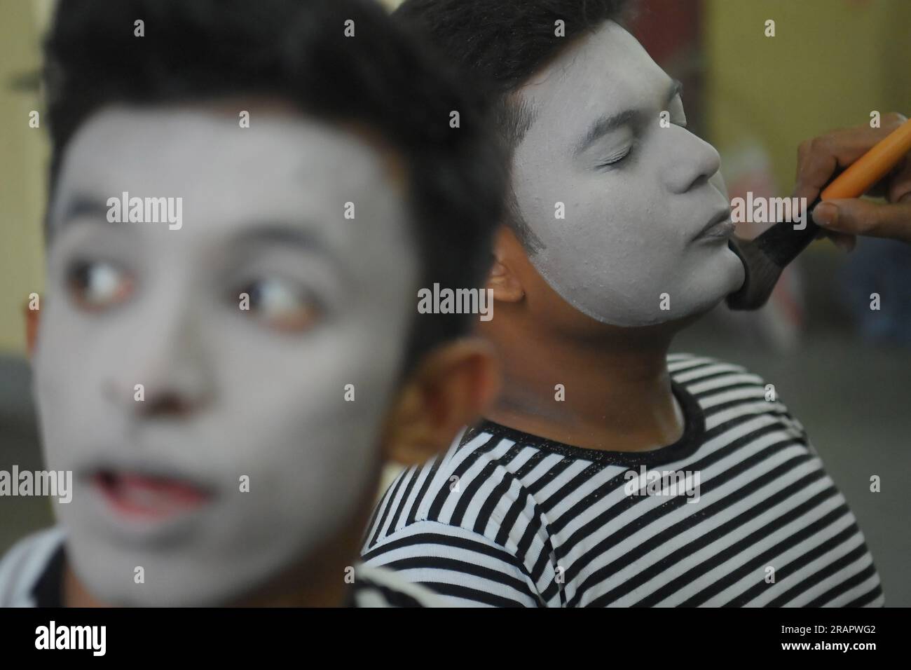 Mime artists from a mime group,"Sur-Pancham", are getting ready for a ...