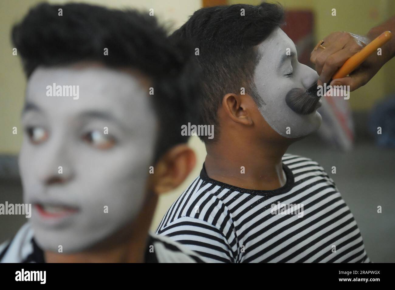 Mime artists from a mime group,"Sur-Pancham", are getting ready for a ...