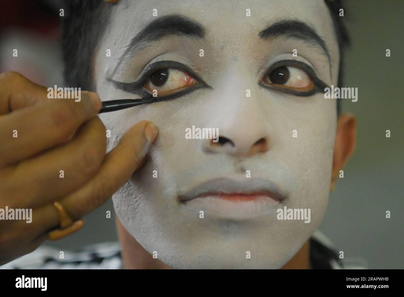 Mime artists from a mime group,"Sur-Pancham", are getting ready for a ...