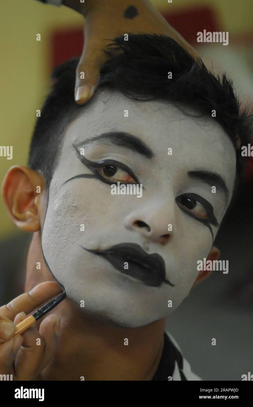 Mime artists from a mime group,"Sur-Pancham", are getting ready for a ...