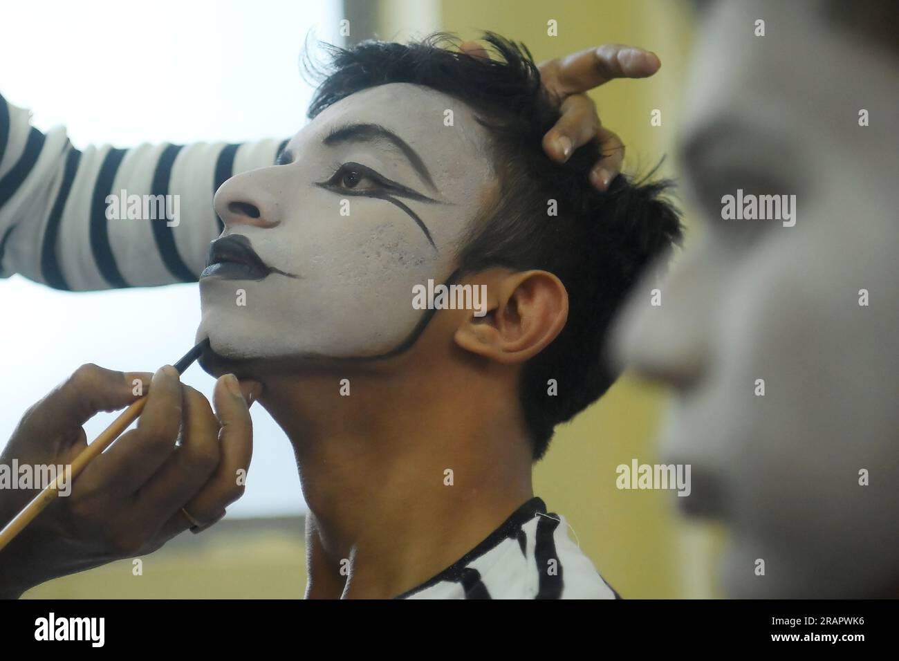 Mime artists from a mime group,"Sur-Pancham", are getting ready for a ...