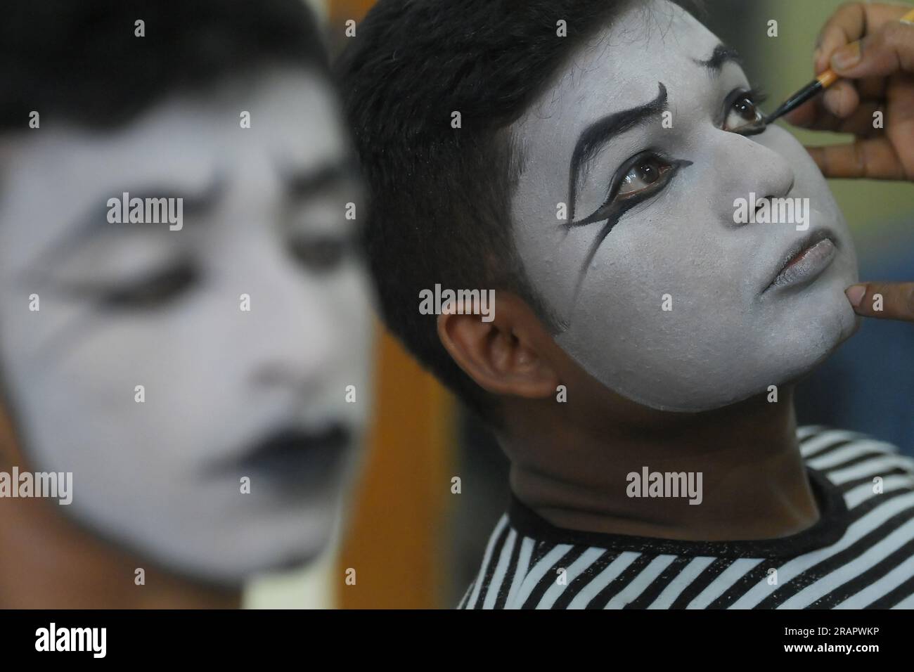 Mime artists from a mime group,"Sur-Pancham", are getting ready for a ...