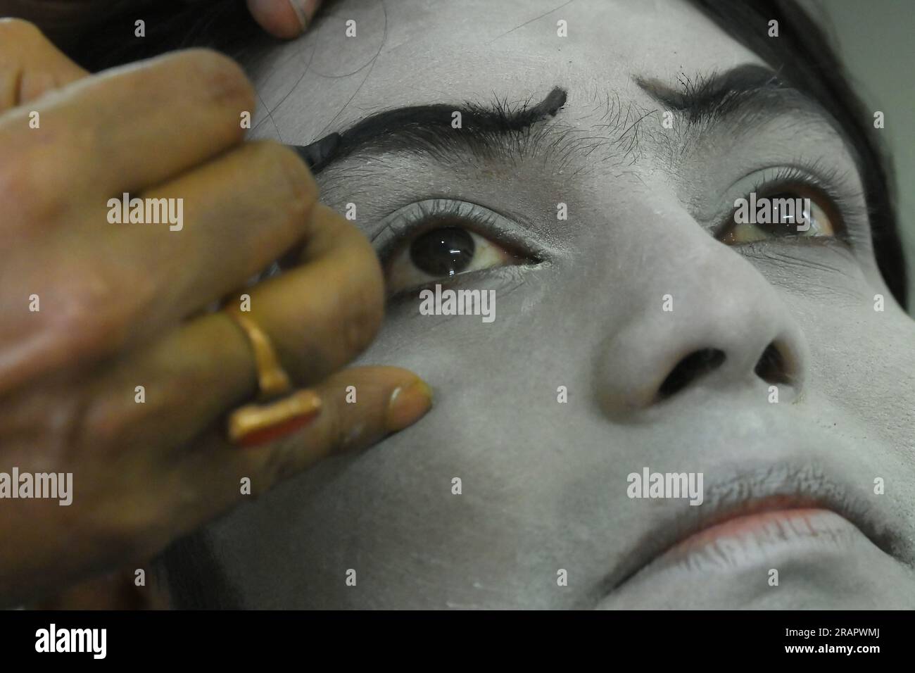 Mime artists from a mime group,"Sur-Pancham", are getting ready for a ...