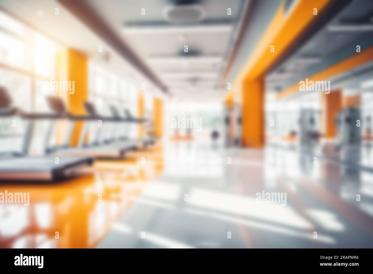 Blurred background of an empty fitness room with beautiful lighting ...