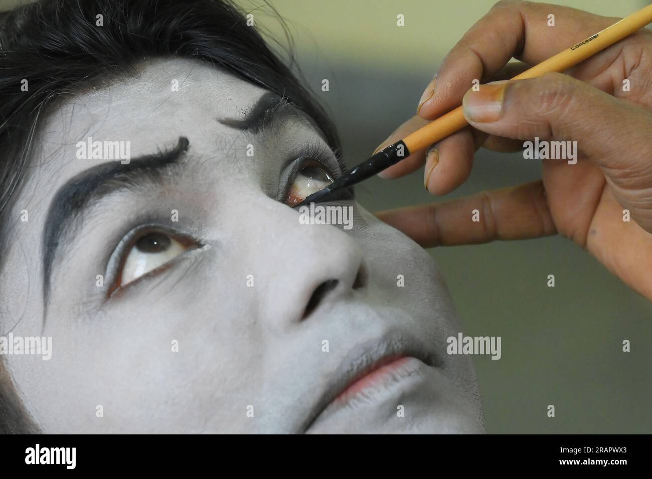 Mime artists from a mime group,"Sur-Pancham", are getting ready for a ...
