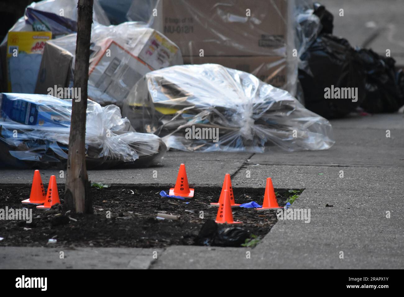 Evidence markers seen at the shooting incident. This shooting is part ...
