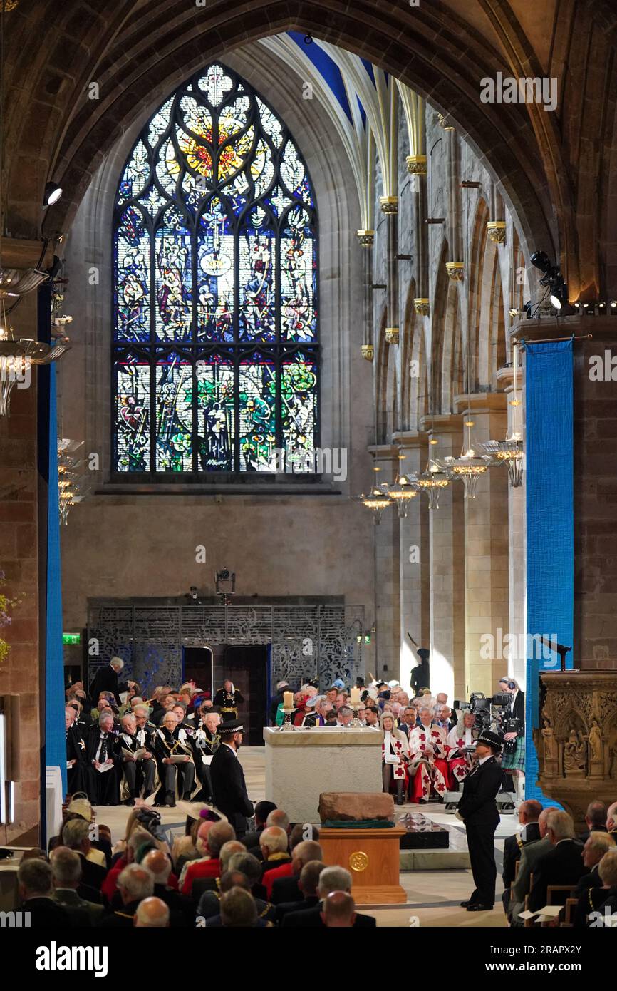 Guests and dignitaries attend the National Service of Thanksgiving and ...