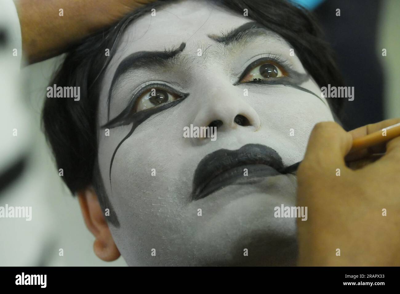 Mime artists from a mime group,"Sur-Pancham", are getting ready for a ...