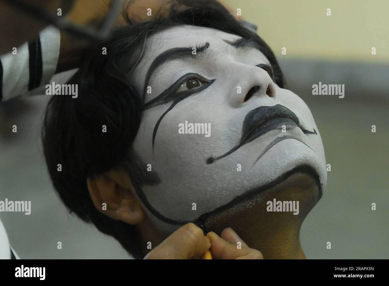 Mime artists from a mime group,"Sur-Pancham", are getting ready for a ...
