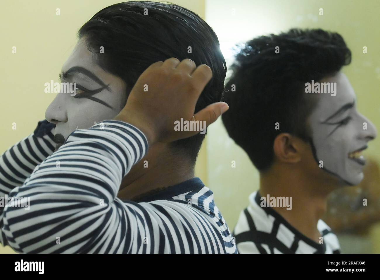 Mime artists from a mime group,"Sur-Pancham", are getting ready for a ...