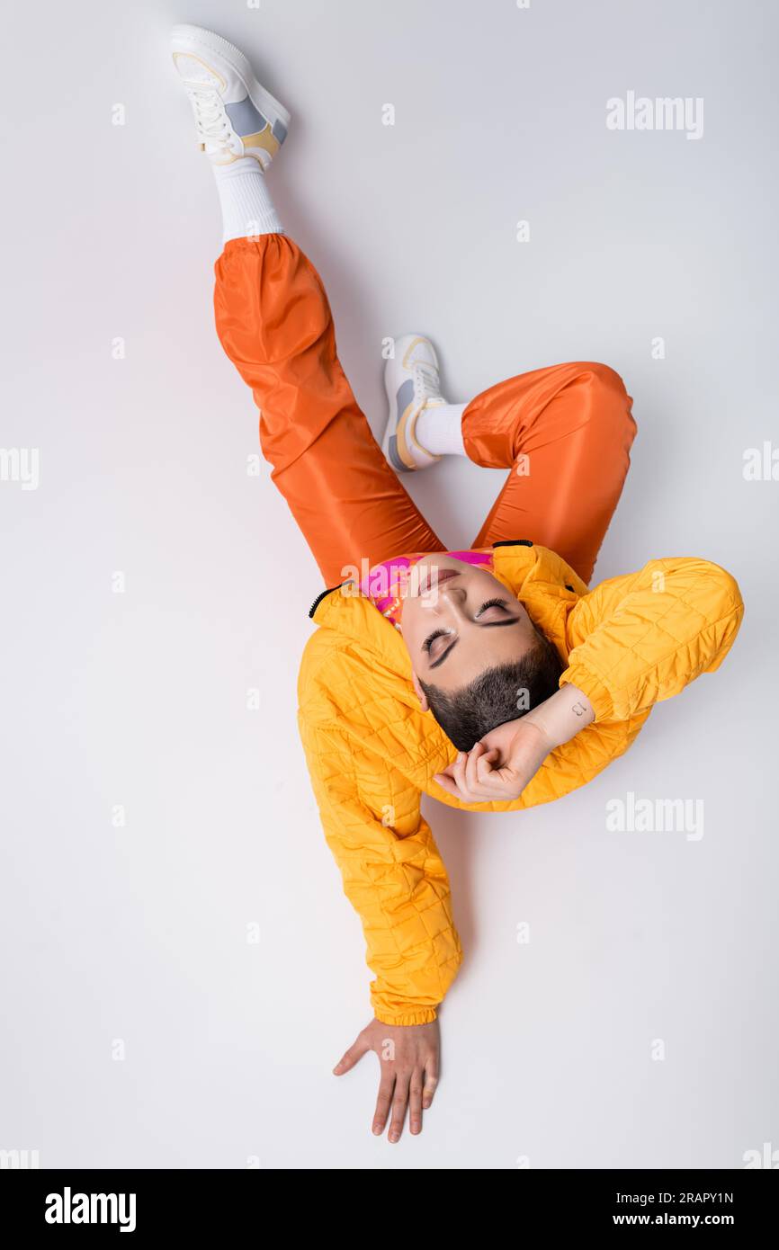 top view, creative photography, fashion statement, tattooed young woman ...