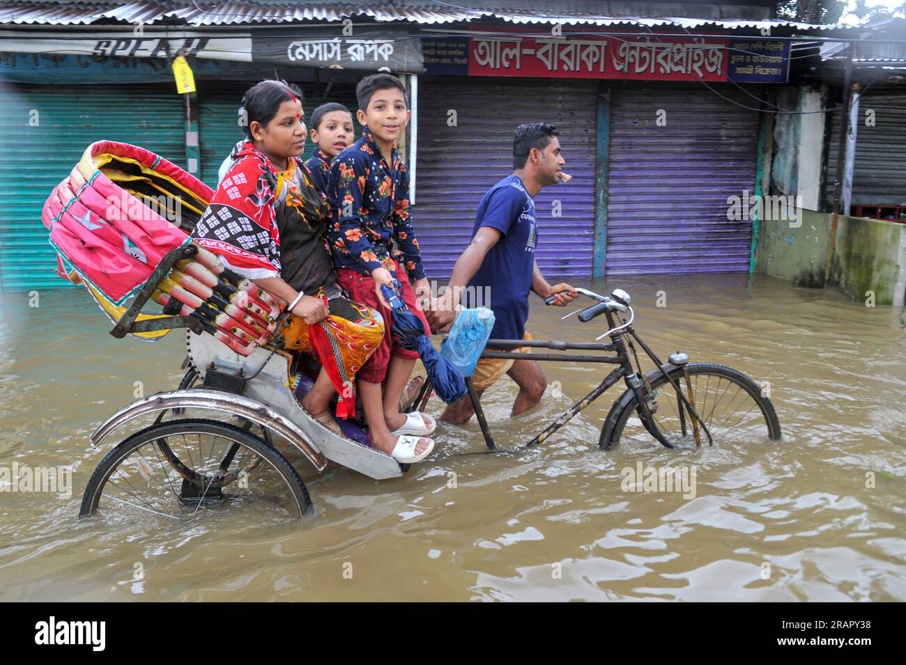 People make their way during heavy rainfall. Incessant rains for the ...