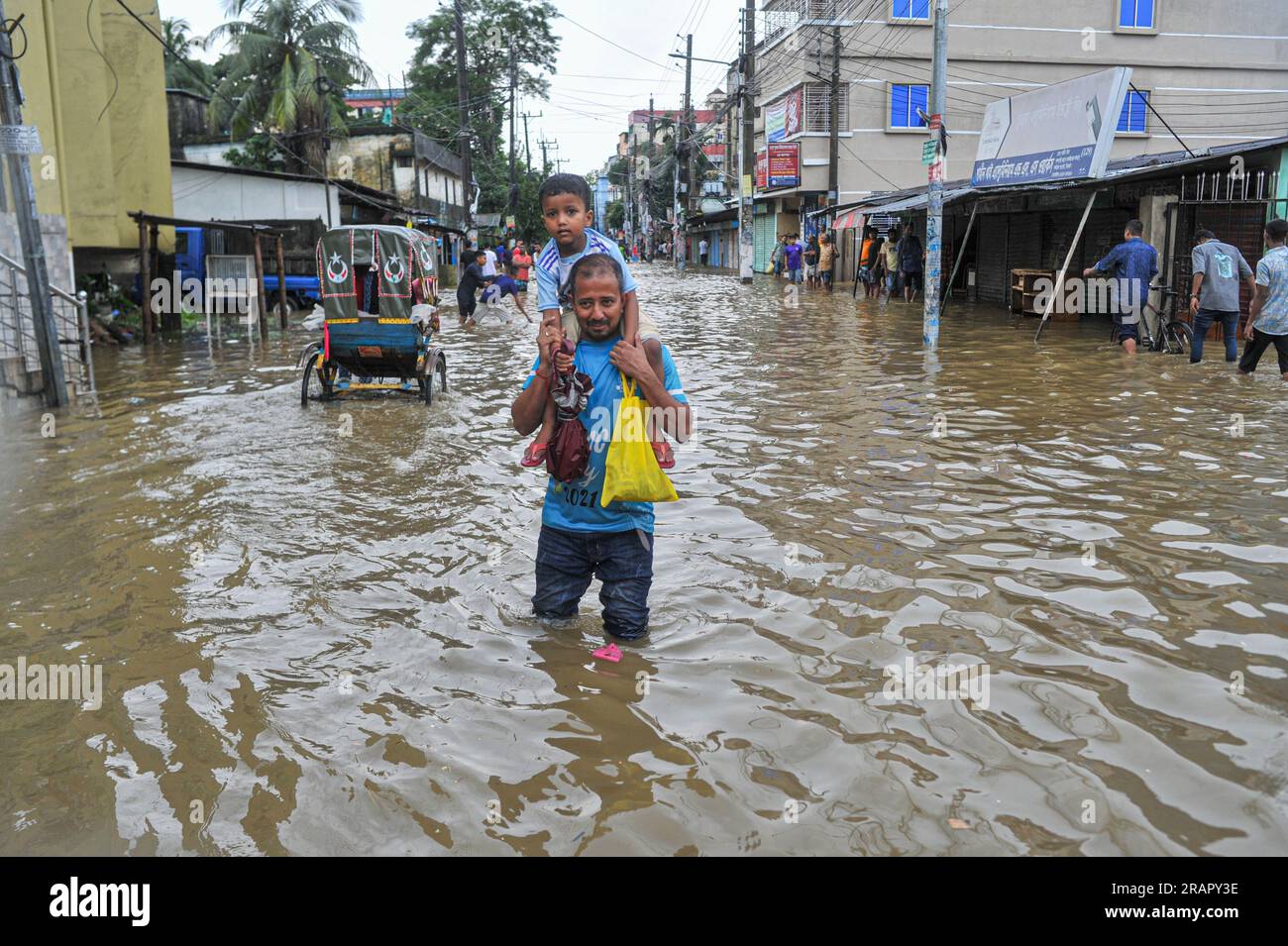 People make their way during heavy rainfall. Incessant rains for the ...