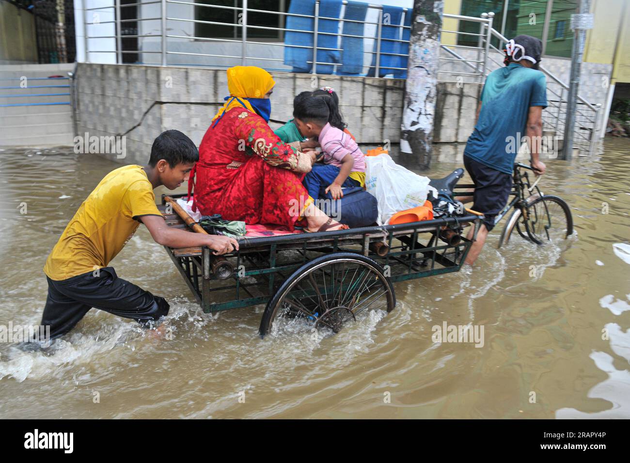 People make their way during heavy rainfall. Incessant rains for the ...