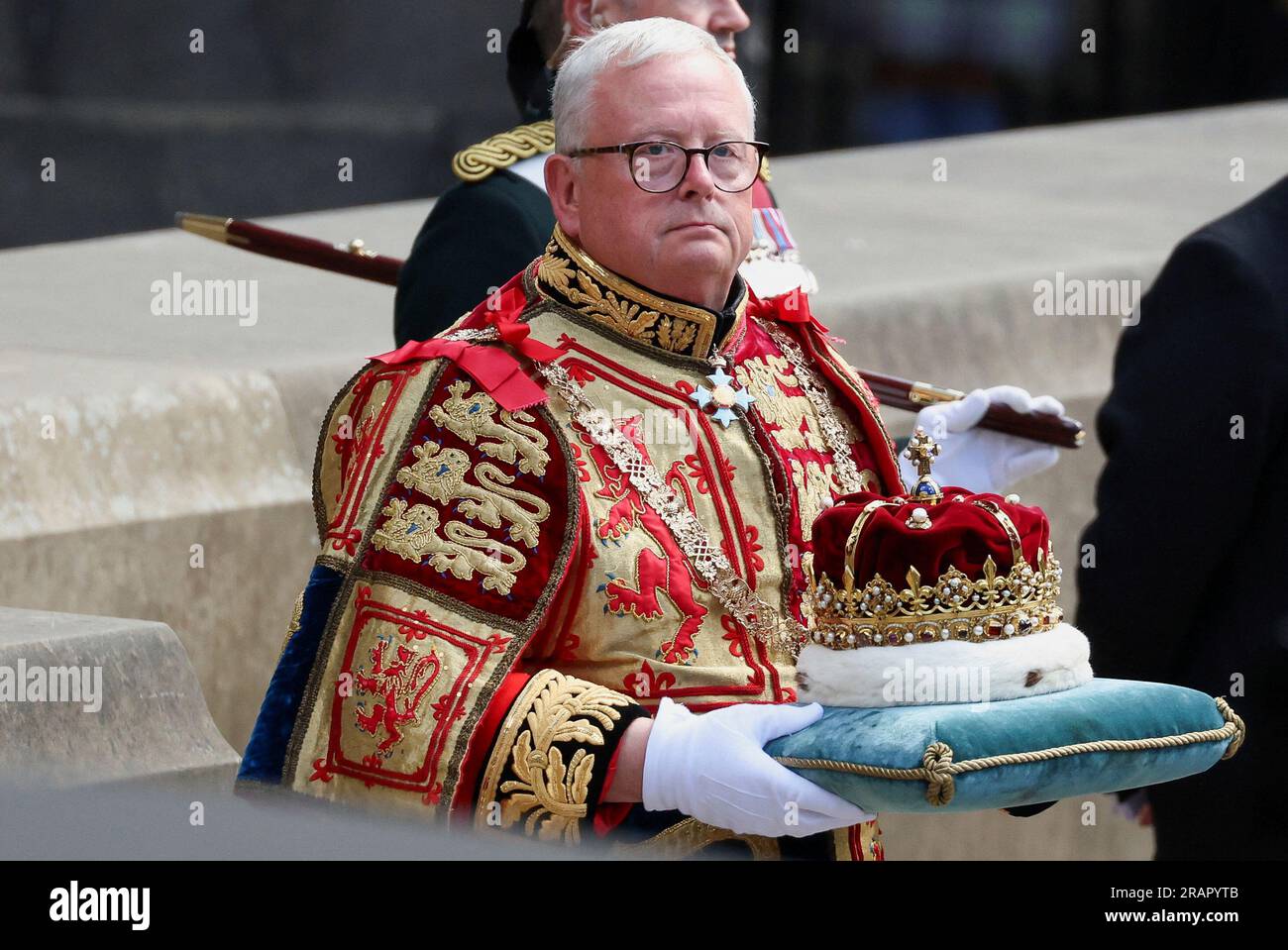 Joseph John Morrow, Lord Lyon King of Arms carries the Crown of ...