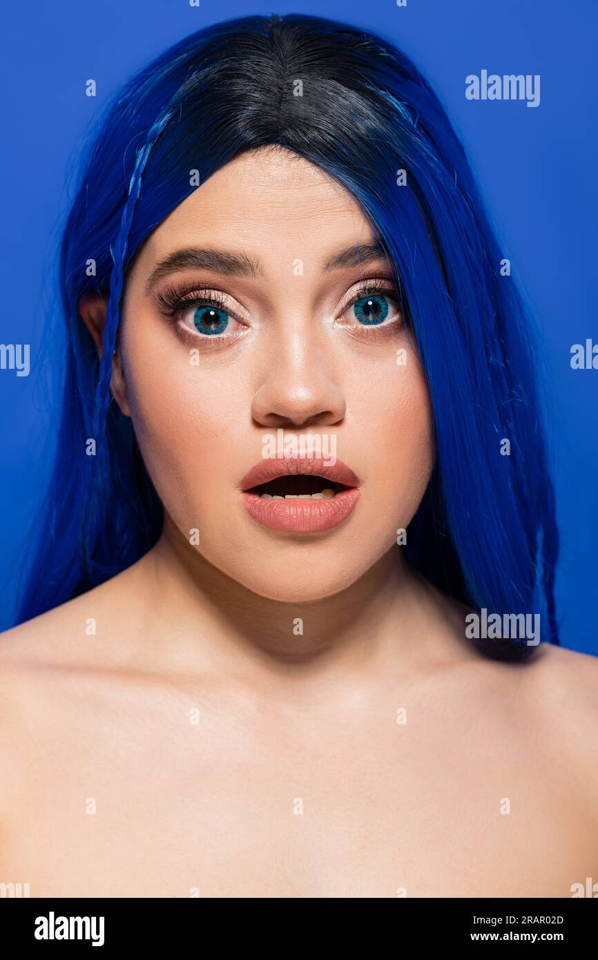 beauty trends concept, portrait of shocked young woman with dyed hair ...