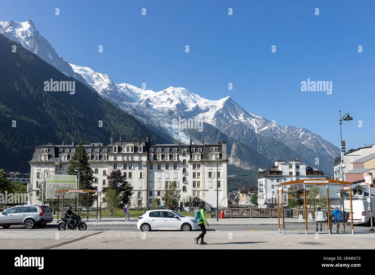 Chamonix village at the feet of the Mont Blanc Massive mountain range with eternal snow tops in ...
