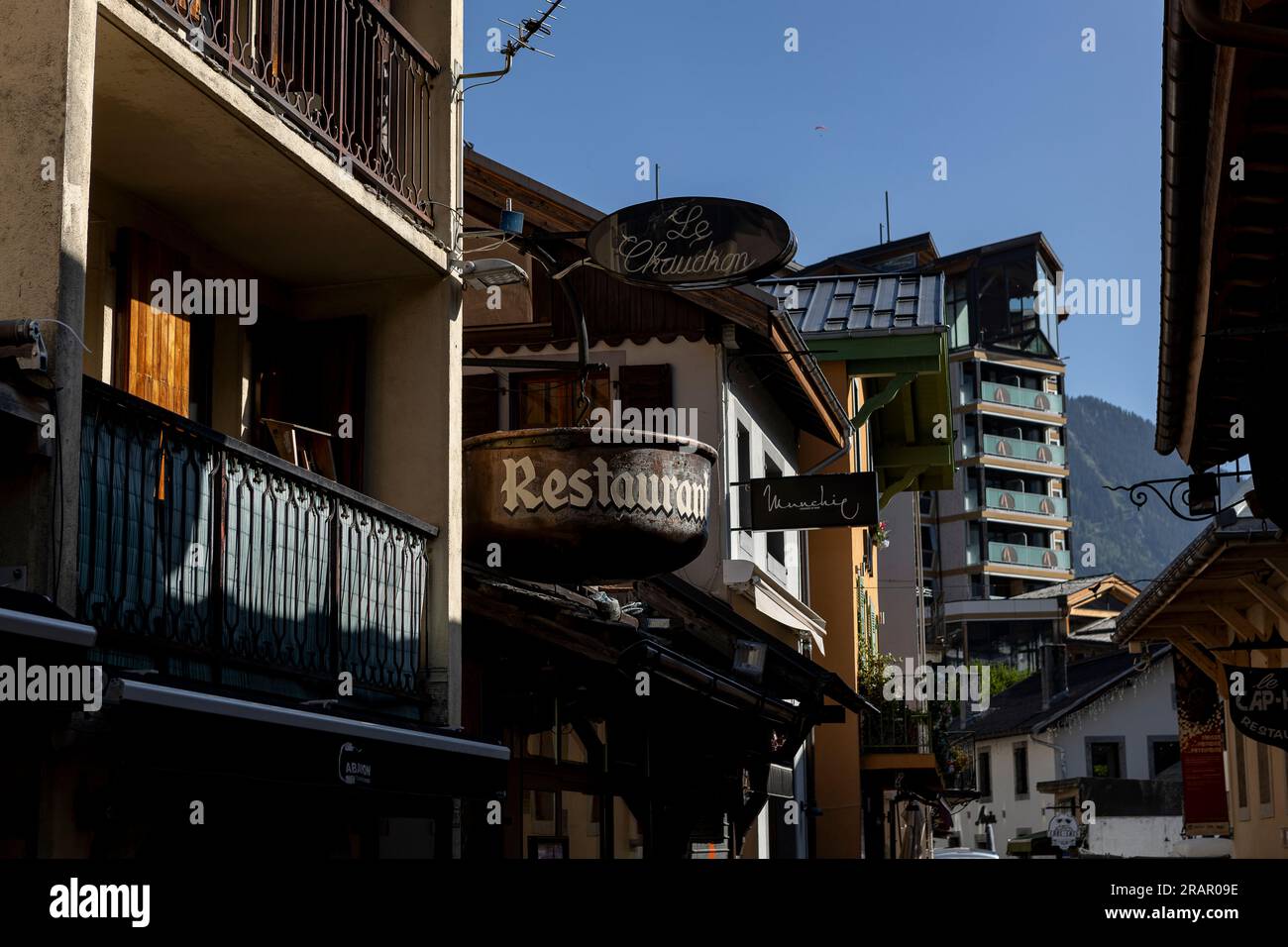 Chamonix village at the feet of the Mont Blanc Massive mountain range ...