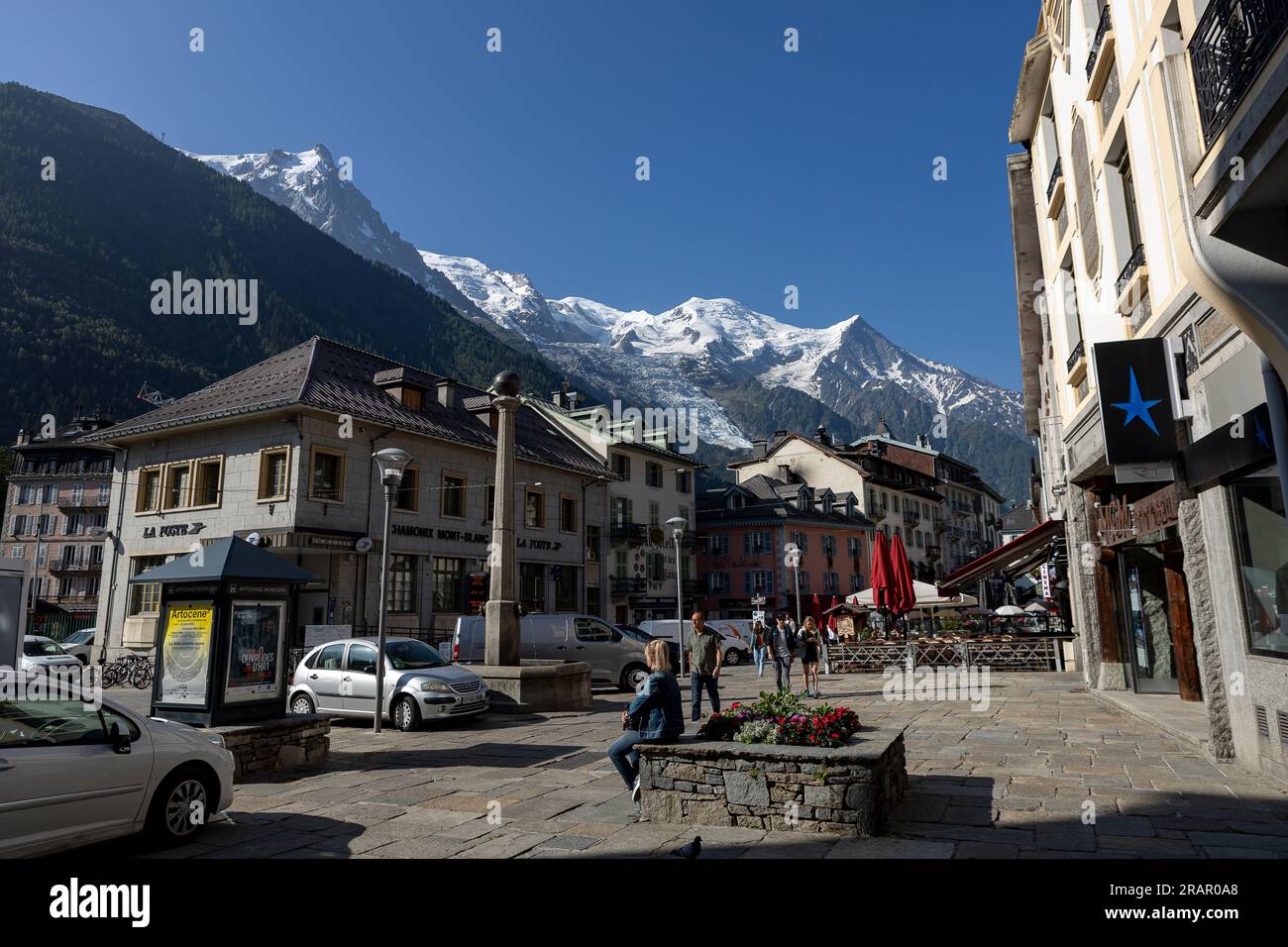 Chamonix village at the feet of the Mont Blanc Massive mountain range with eternal snow tops in ...