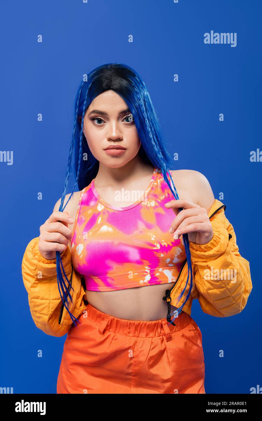 beauty trends, dyed hair, tattooed model with blue hair posing in ...