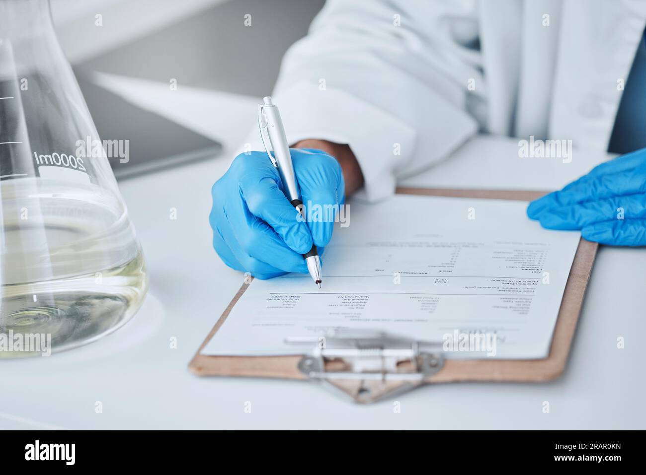Medicine, writing and science with hands of man in laboratory for ...