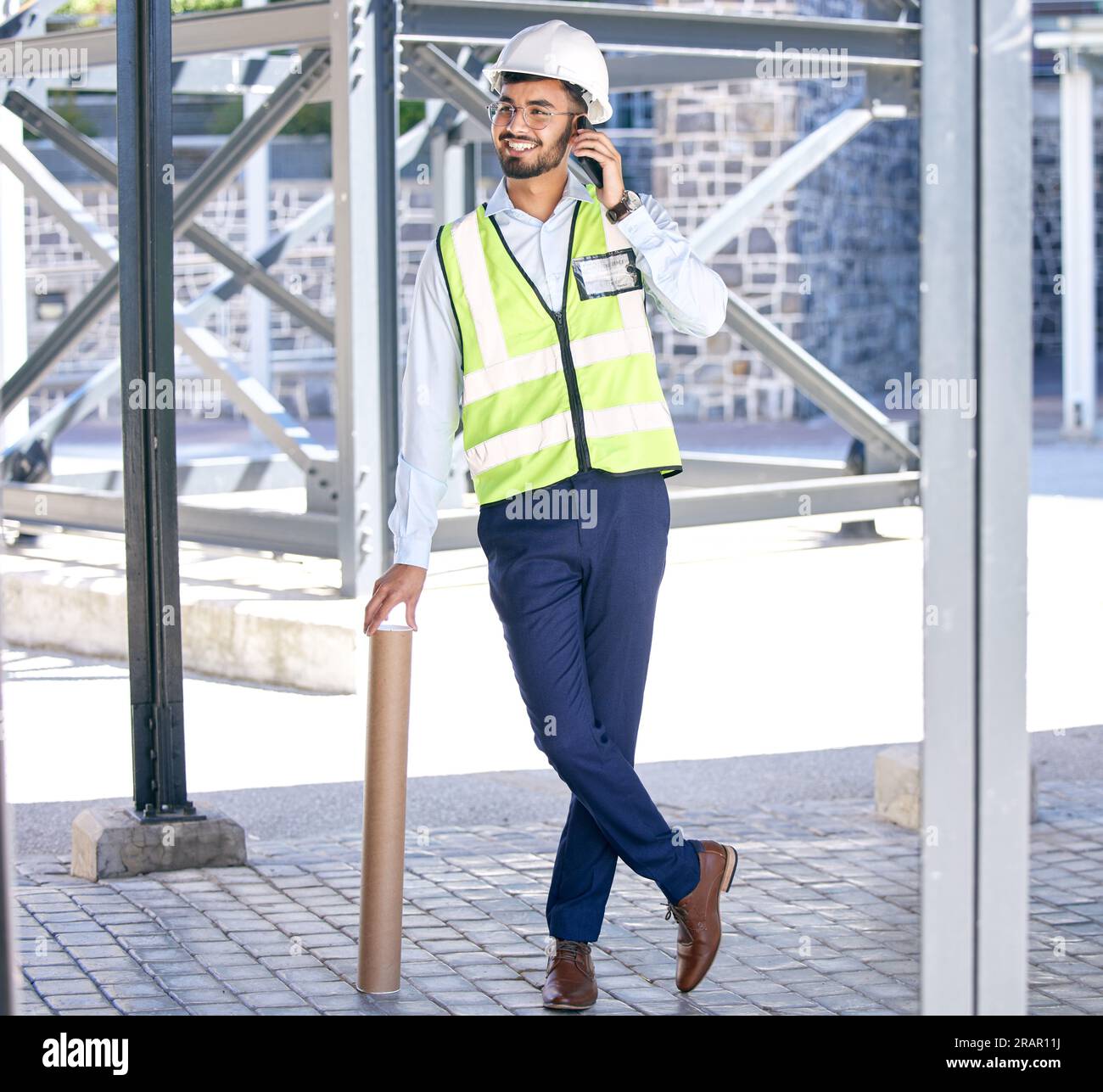 Architect, phone call and happy man with blueprint at construction site ...