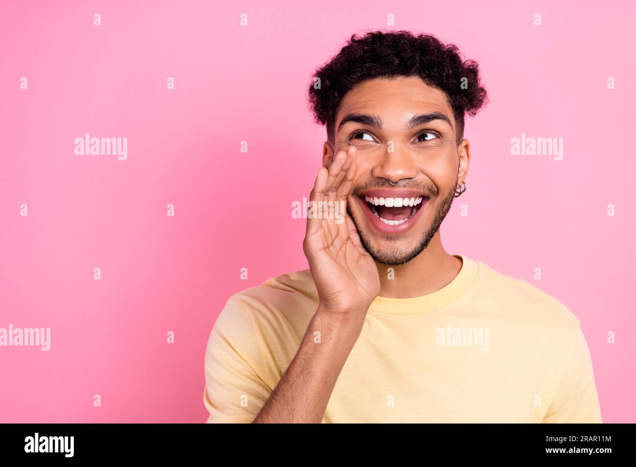 Photo of funny young promoter guy pronouncing advertisement hand near ...