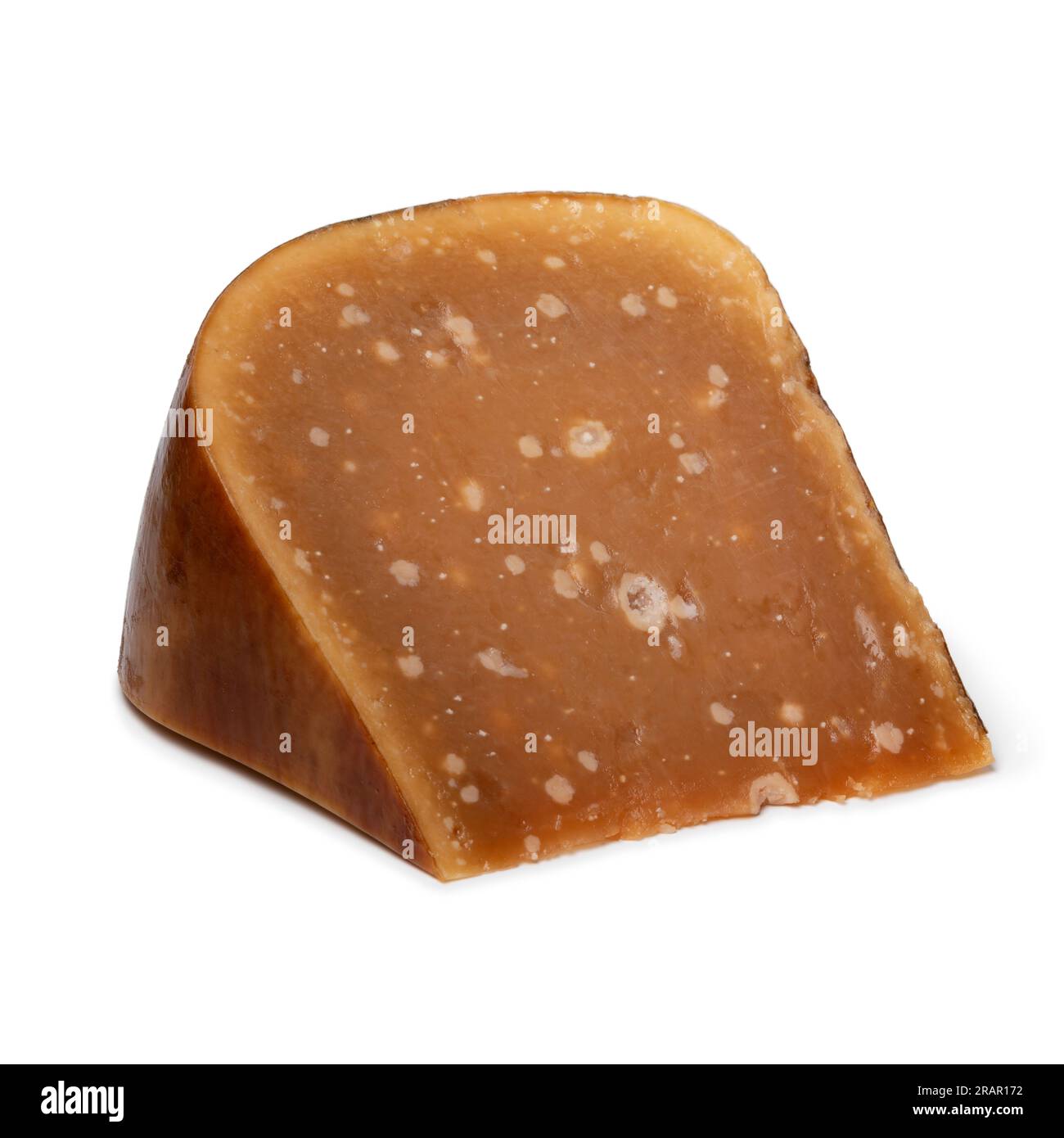 Piece of artisanal very old Dutch goat cheese close up isolated on ...